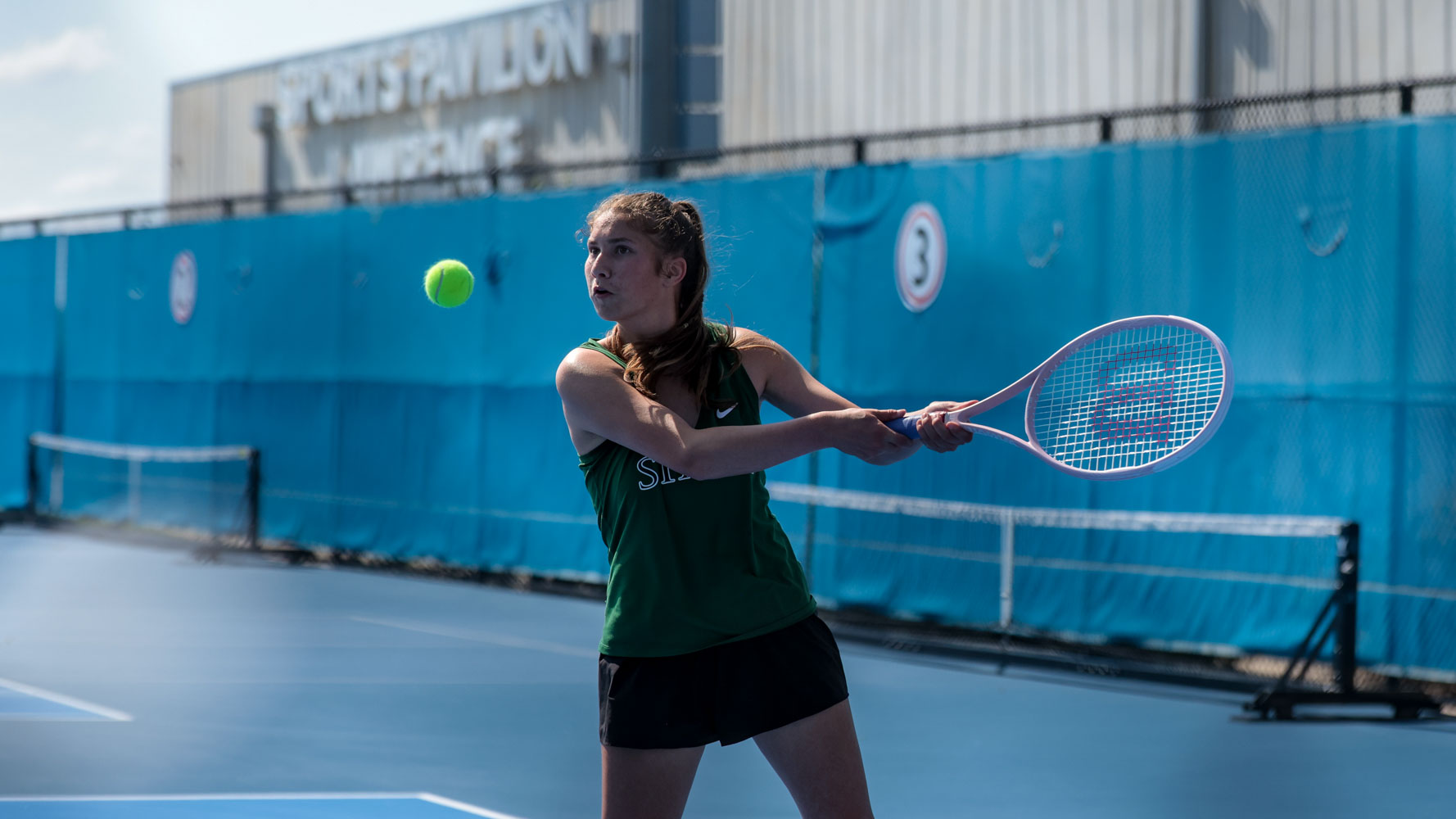 PHOTOS: Lawrence, Free State girls tennis in quad at Rock Chalk Park ...